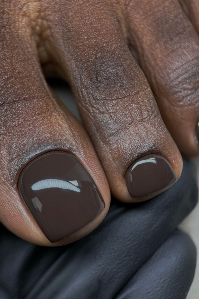22 Chic & Bold Dark Toe Nail Colors to Try This Season